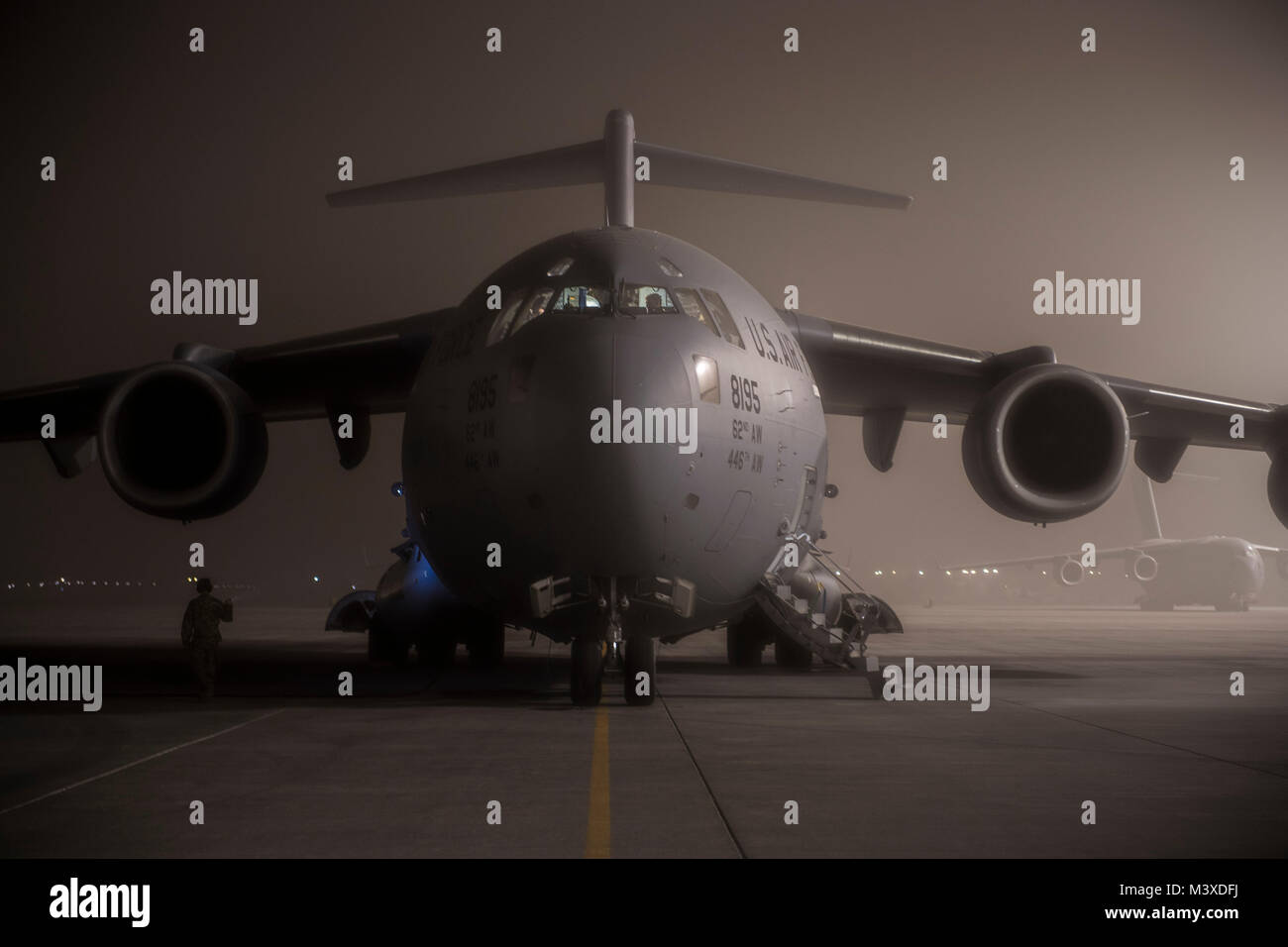 A U.S. Air Force C-17 Globemaster III flying crew chief, assigned to ...