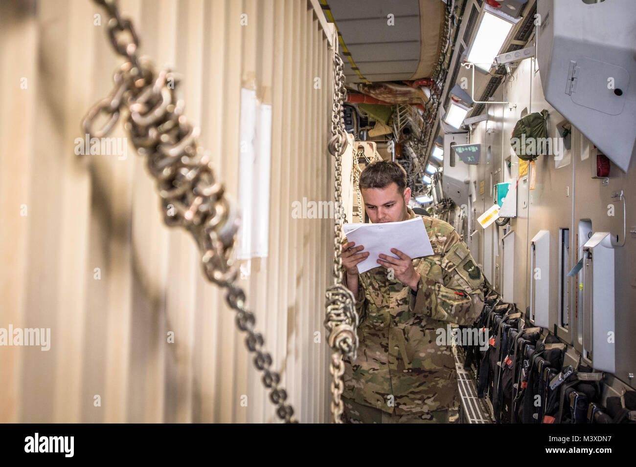 U.S. Air Force Staff Sgt. Sam Hardy, a loadmaster assigned to the 816th ...