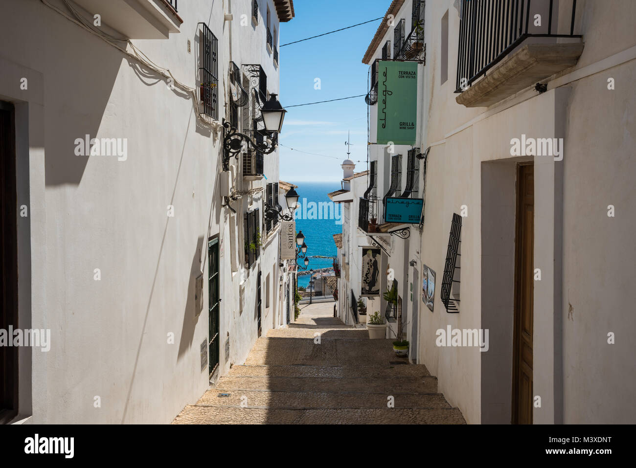 Altea coast with waves after the storm Stock Photo - Alamy