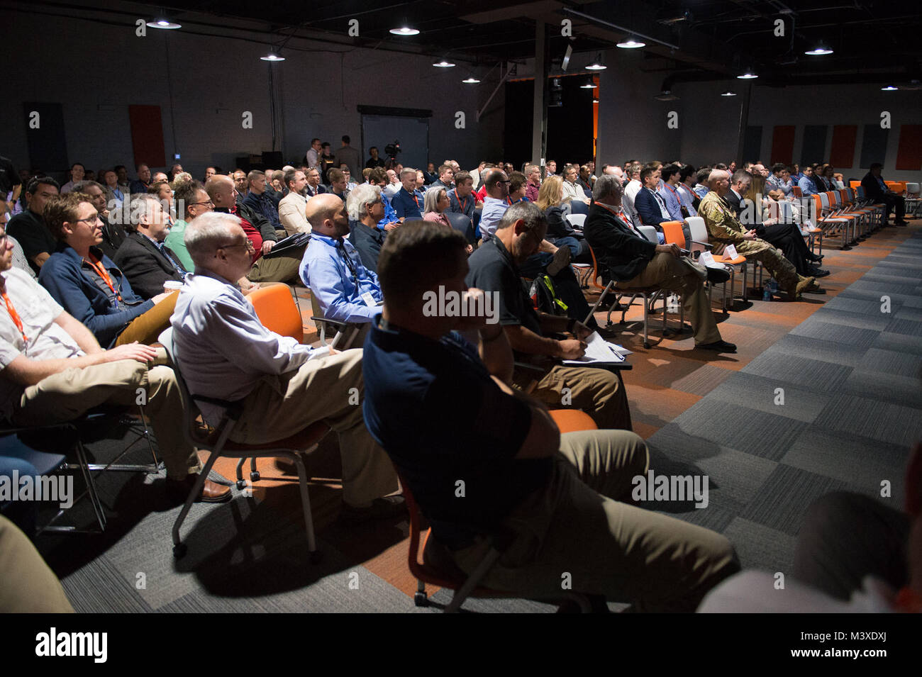 Service members and representatives from technology industries, academia and laboratories attend ...