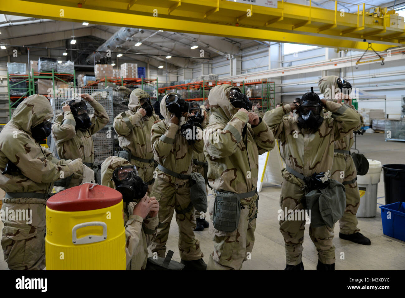 Team Dover Airmen don Mission Oriented Protective Posture, also known ...