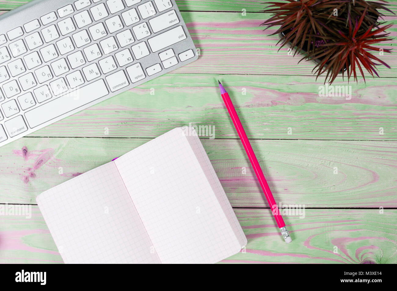 Modern green wooden office desk with laptop computer. Minimal concept ...