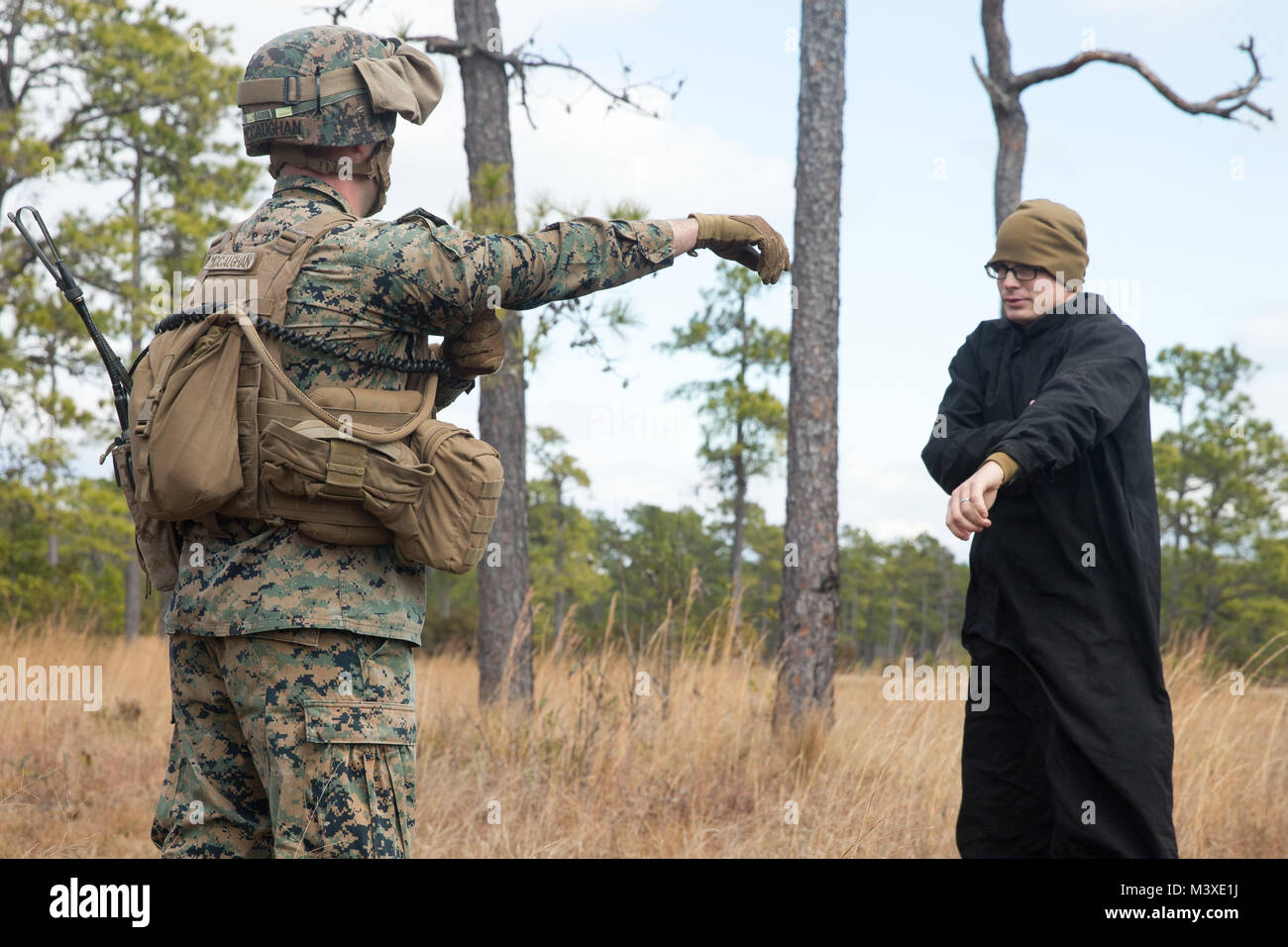 U.S. Marine Corps. Cpl. Dylan T. Mccaughan, squad leader, left, with ...