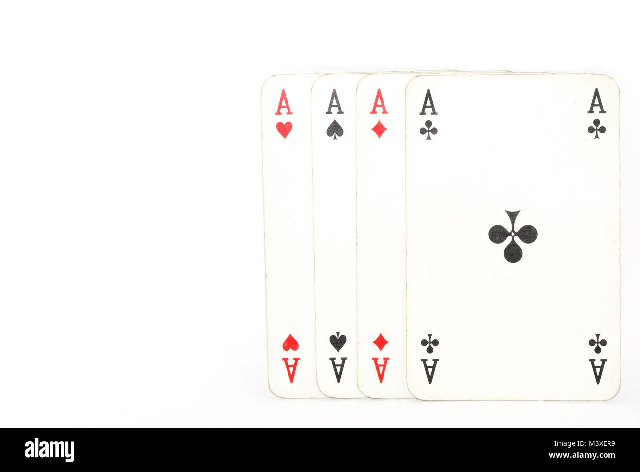 four playing cards ace playing cards on white background complete view ...