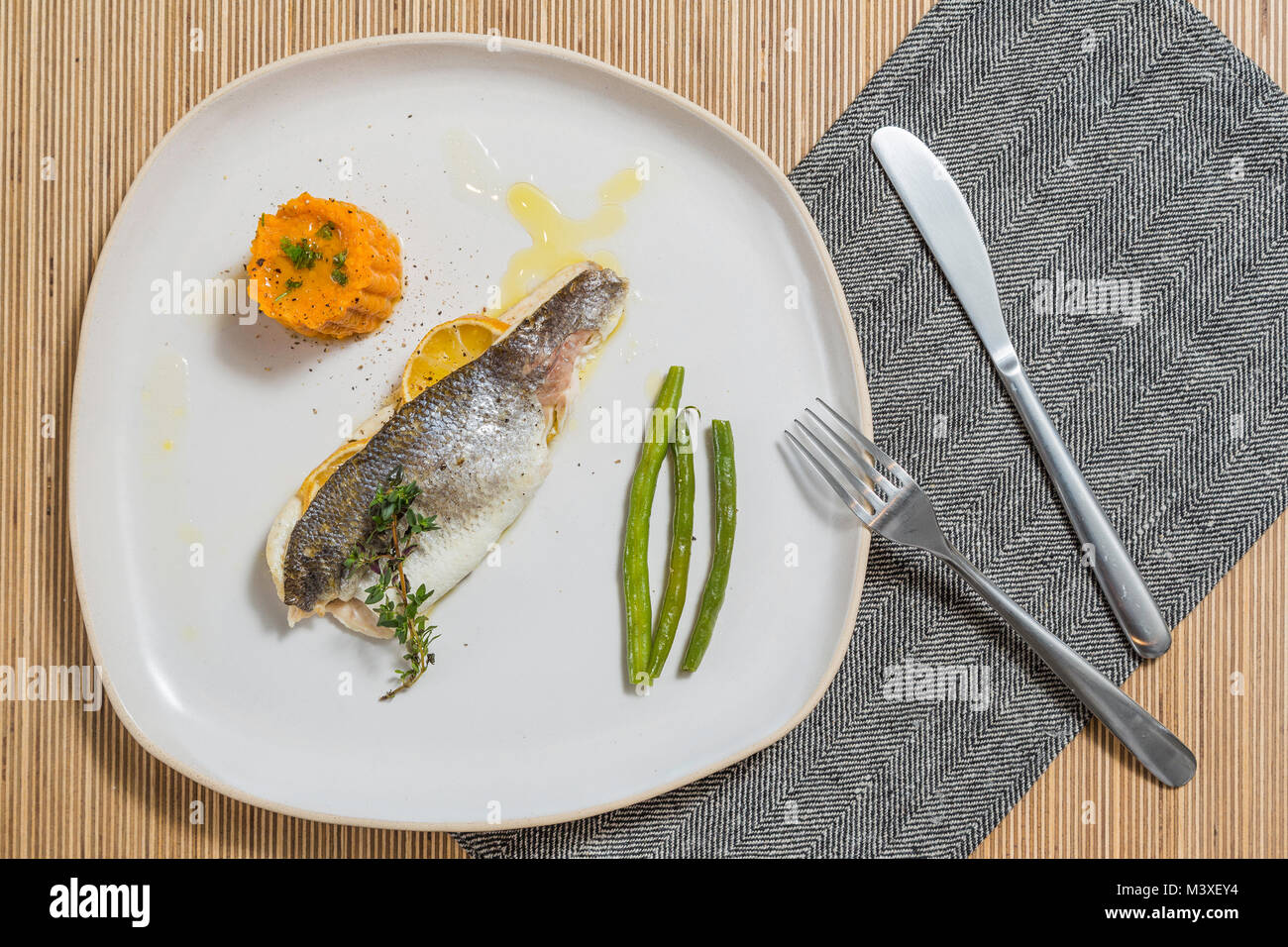 Fish, sweet potato puree, and beans Stock Photo - Alamy
