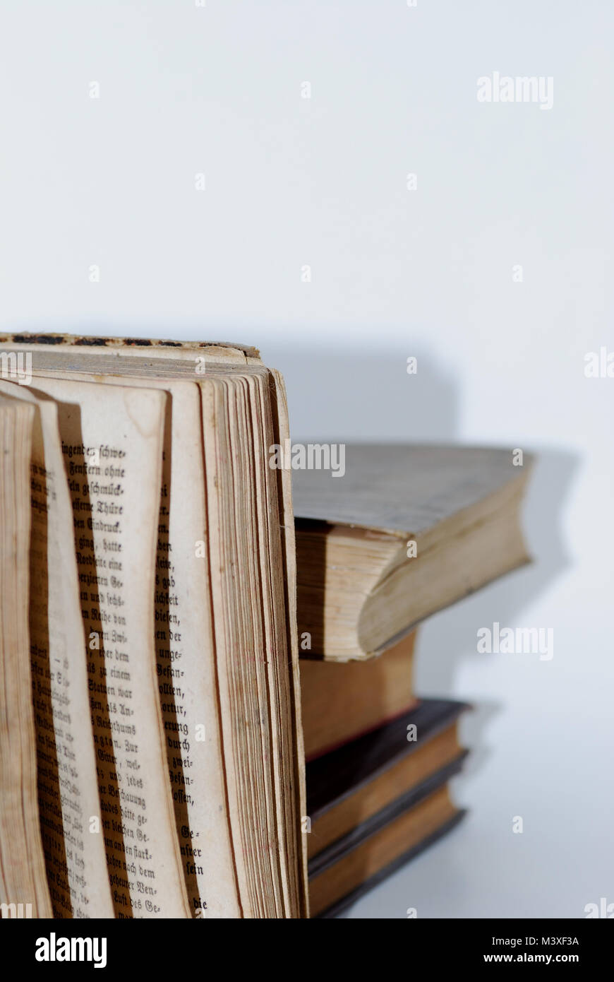 stack of old books to study and learn Stock Photo - Alamy