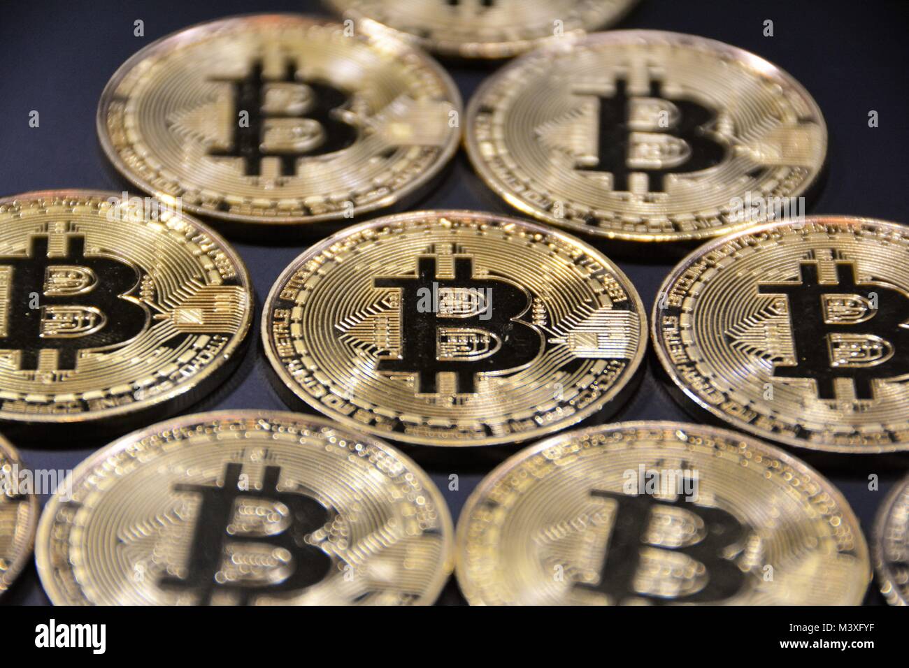 Bit coins with silver dollars and diamonds Stock Photo - Alamy