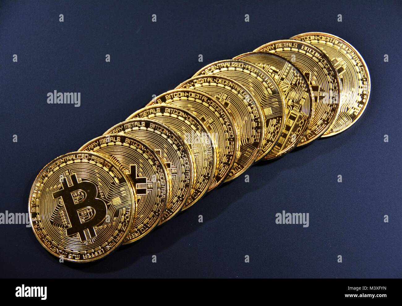 Bit coins with silver dollars and diamonds Stock Photo - Alamy