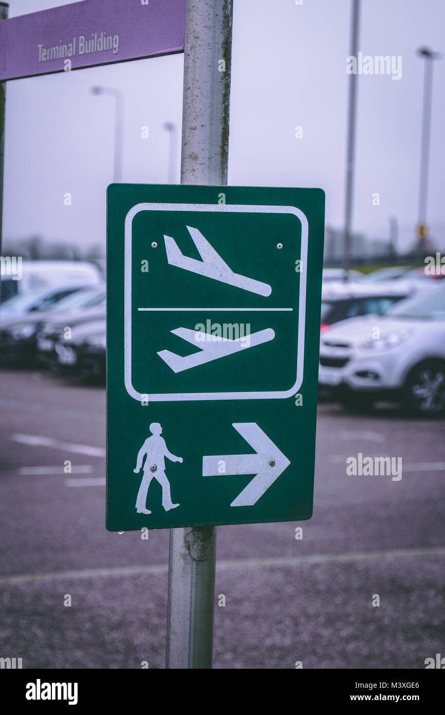 Close up of an airport terminal road sign Stock Photo - Alamy