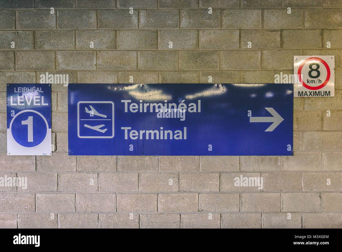 Close up of an airport terminal road sign Stock Photo - Alamy