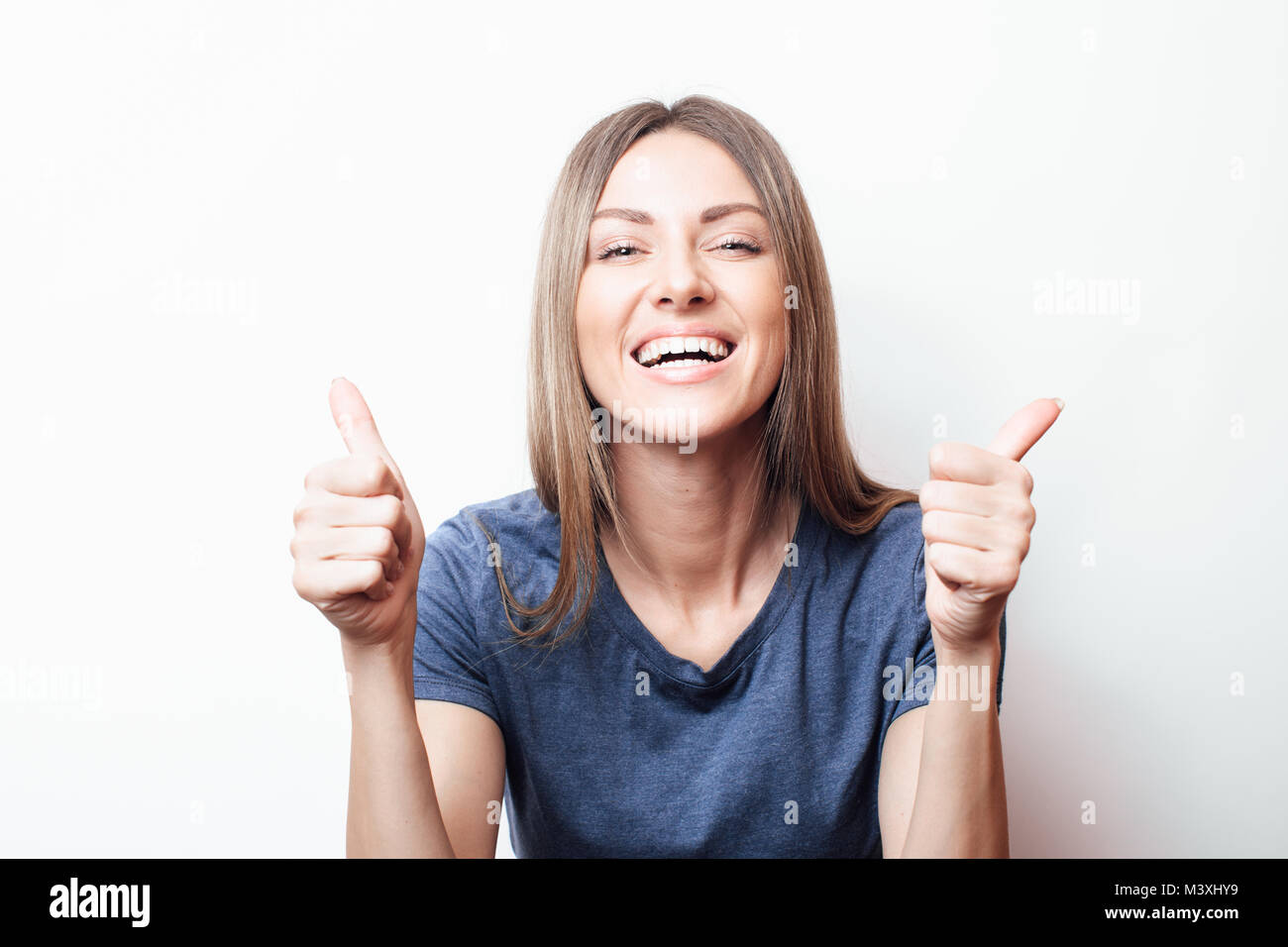 Portrait Of Young Beautiful Cute Cheerful Girl Smiling Looking At
