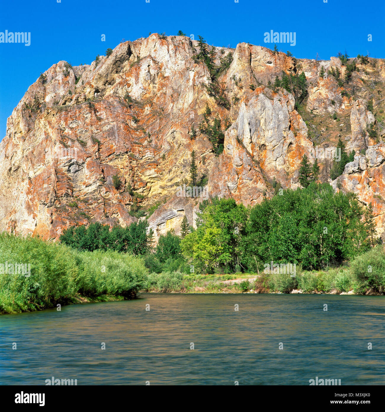 colorful cliff above the clark fork river near bearmouth, montana Stock ...