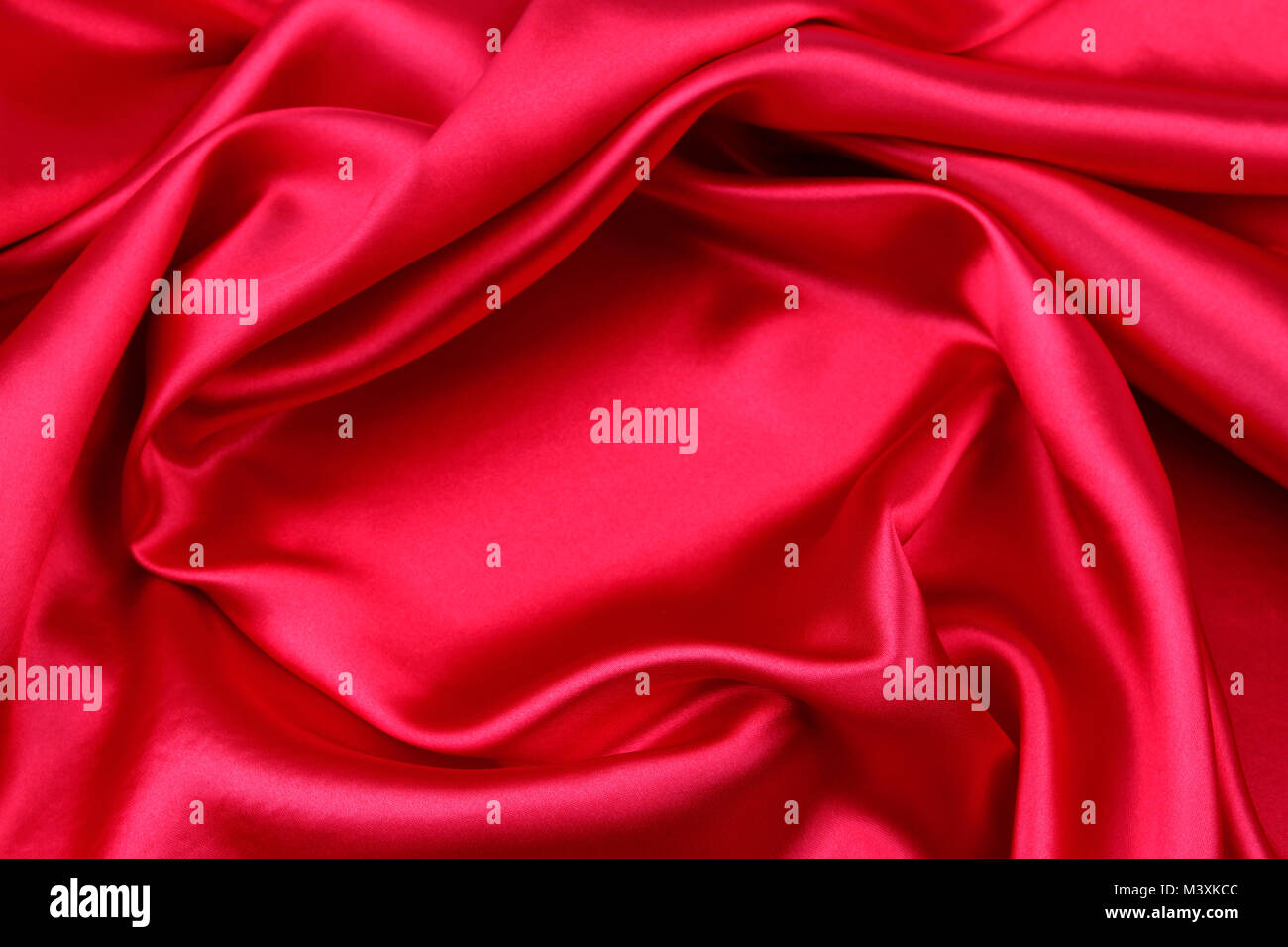 Closeup of ripples in red silk fabric Stock Photo - Alamy