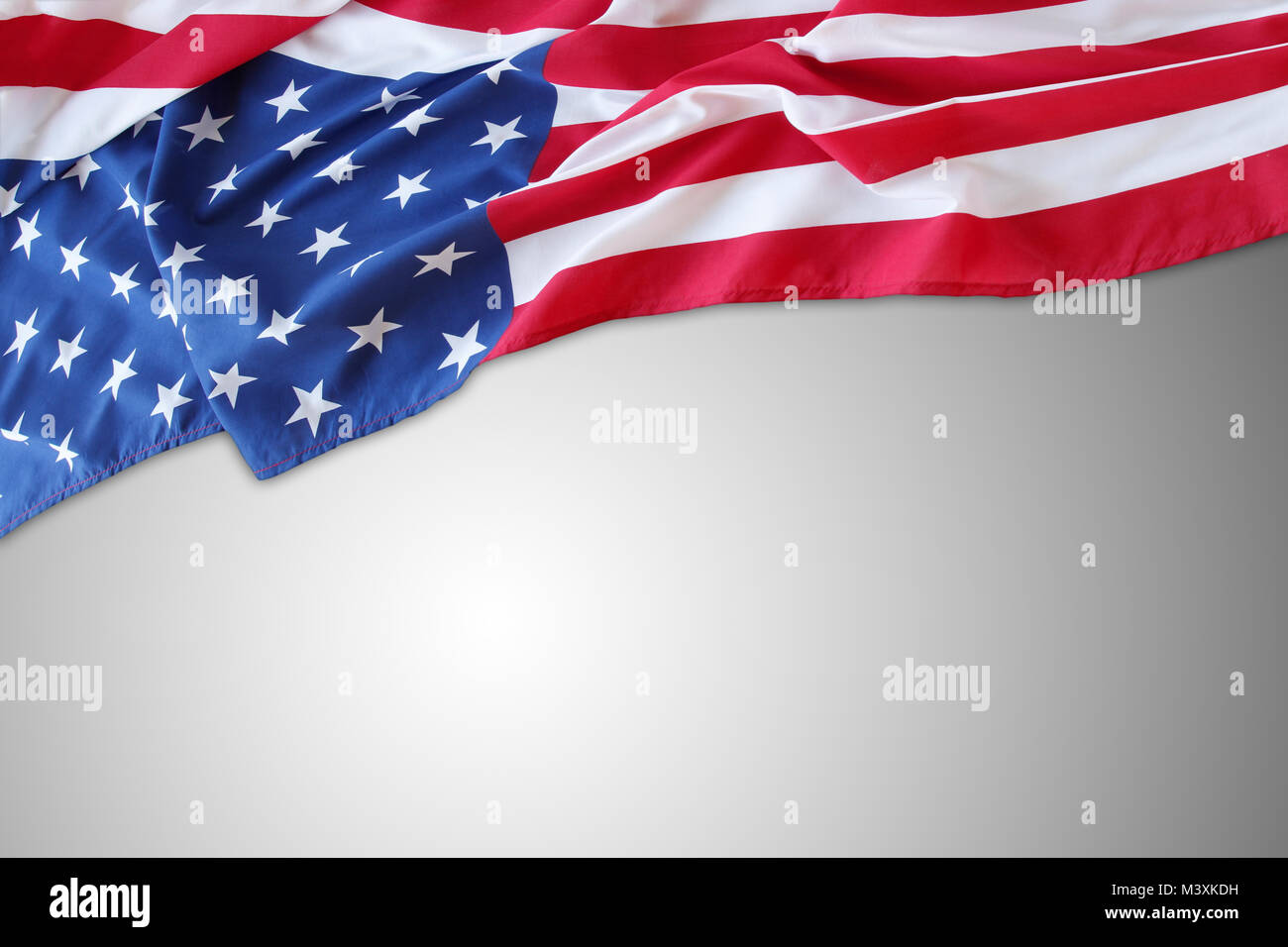 Closeup of American flag on grey background Stock Photo - Alamy