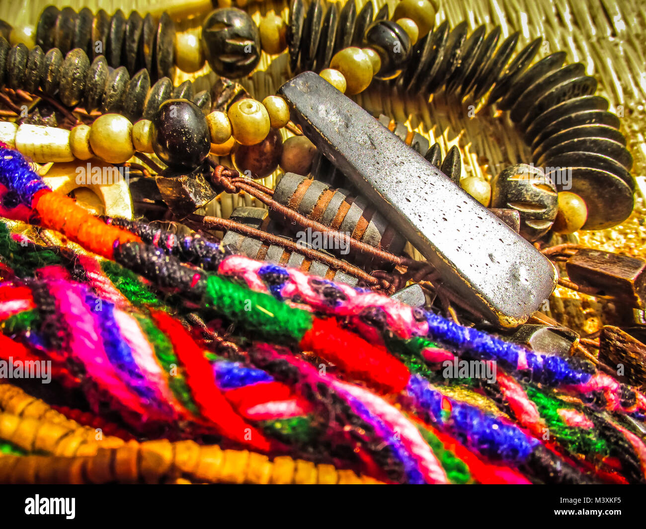 Colorful jewelry sold on the beach in southern India Stock Photo - Alamy