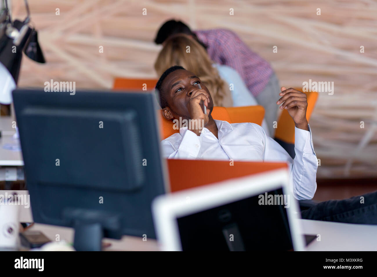 Watching computer screen behind hi-res stock photography and images - Alamy