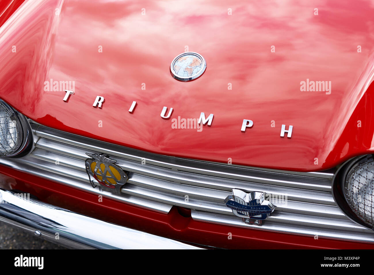 Red Triumph TR 4 sports car Stock Photo - Alamy