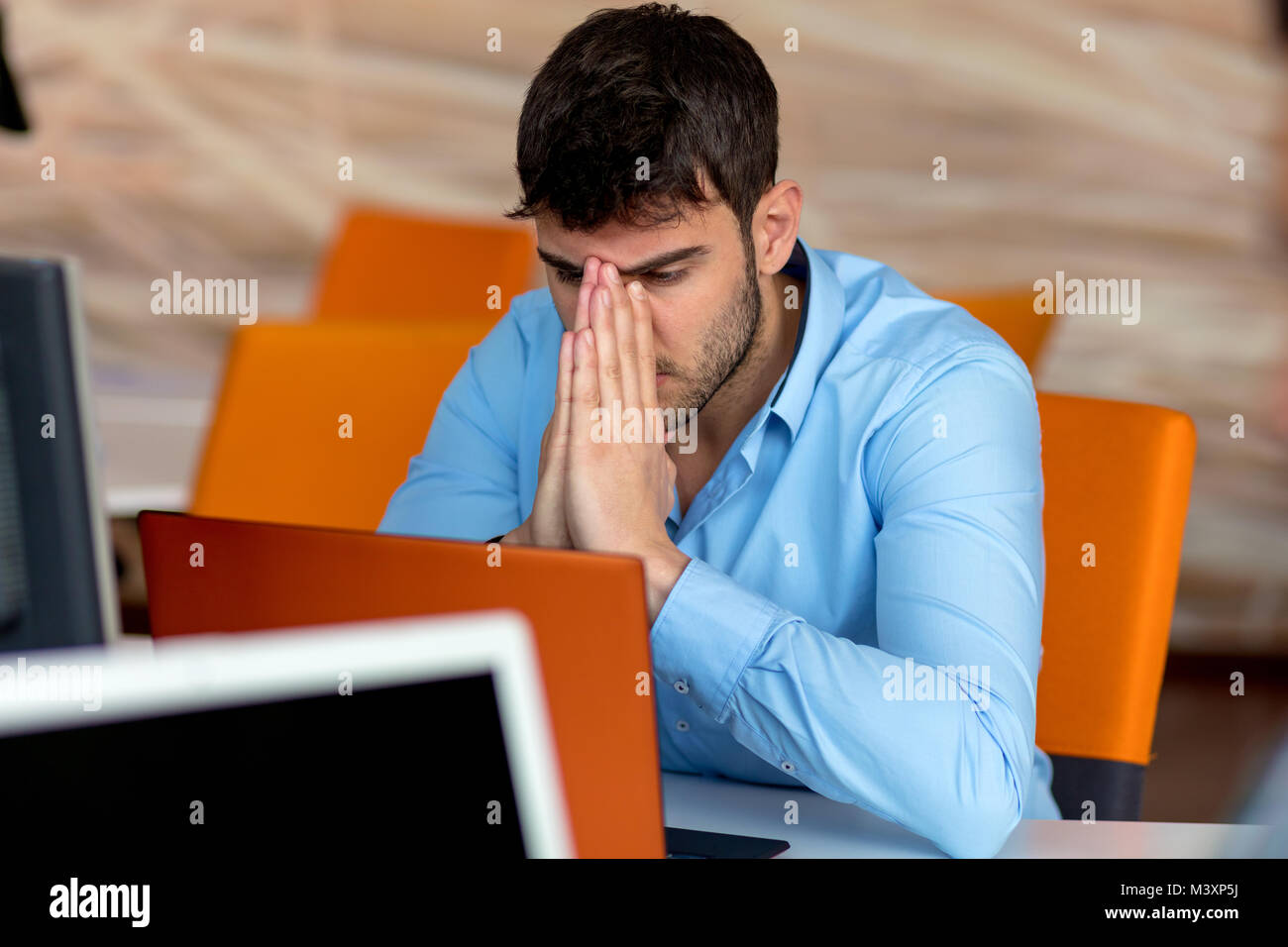 Middle aged businessman shocked working hi-res stock photography and ...