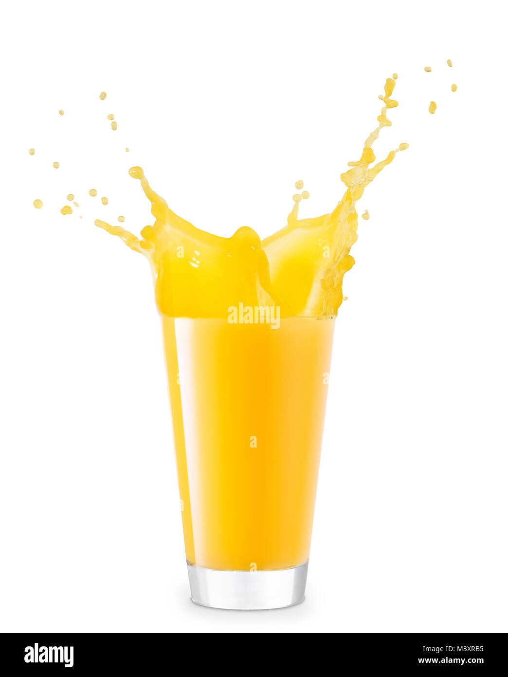 glass of splashing juice isolated on white background. Orange juice ...