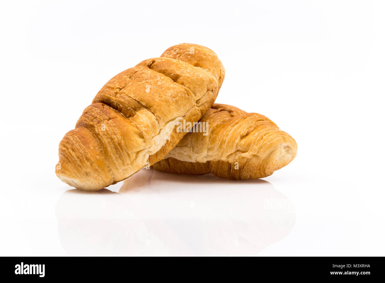 Traditional france breakfest croissant with chocolate isolated on white ...