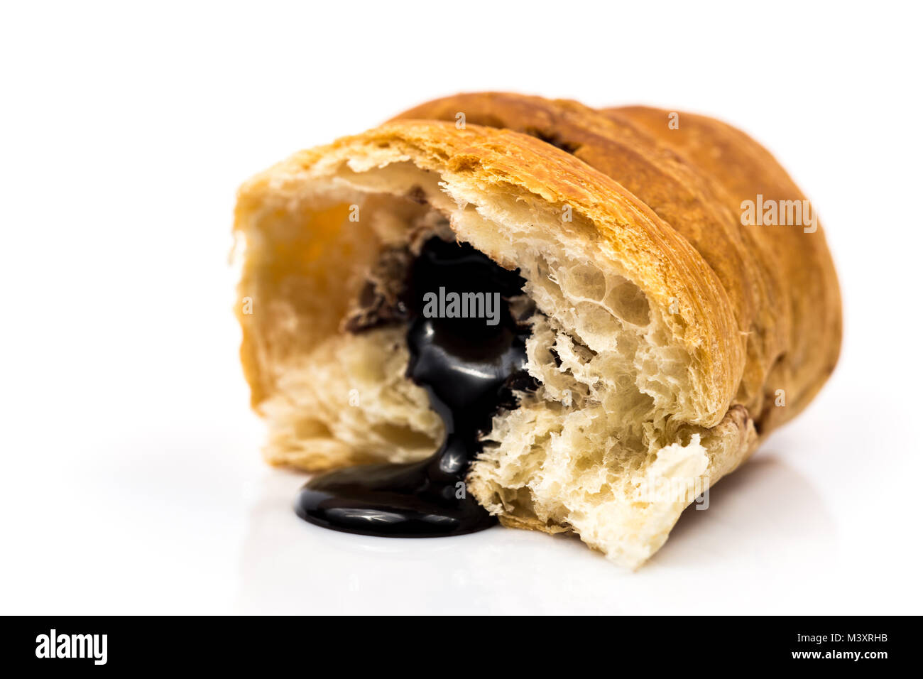 Traditional france breakfest croissant with chocolate isolated on white ...