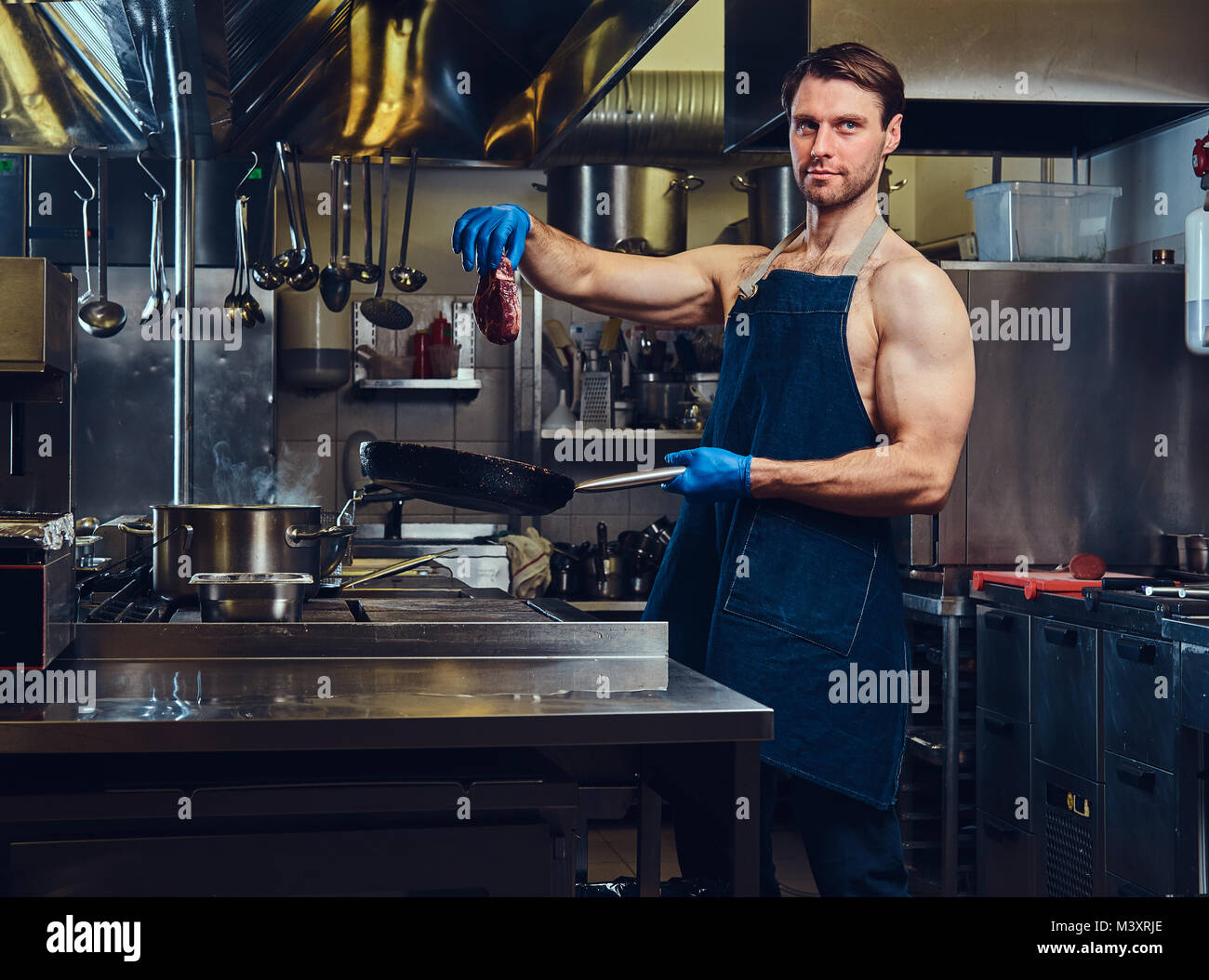 The chef in a kitchen Stock Photo - Alamy