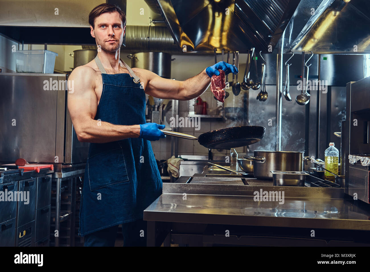 The chef in a kitchen Stock Photo - Alamy