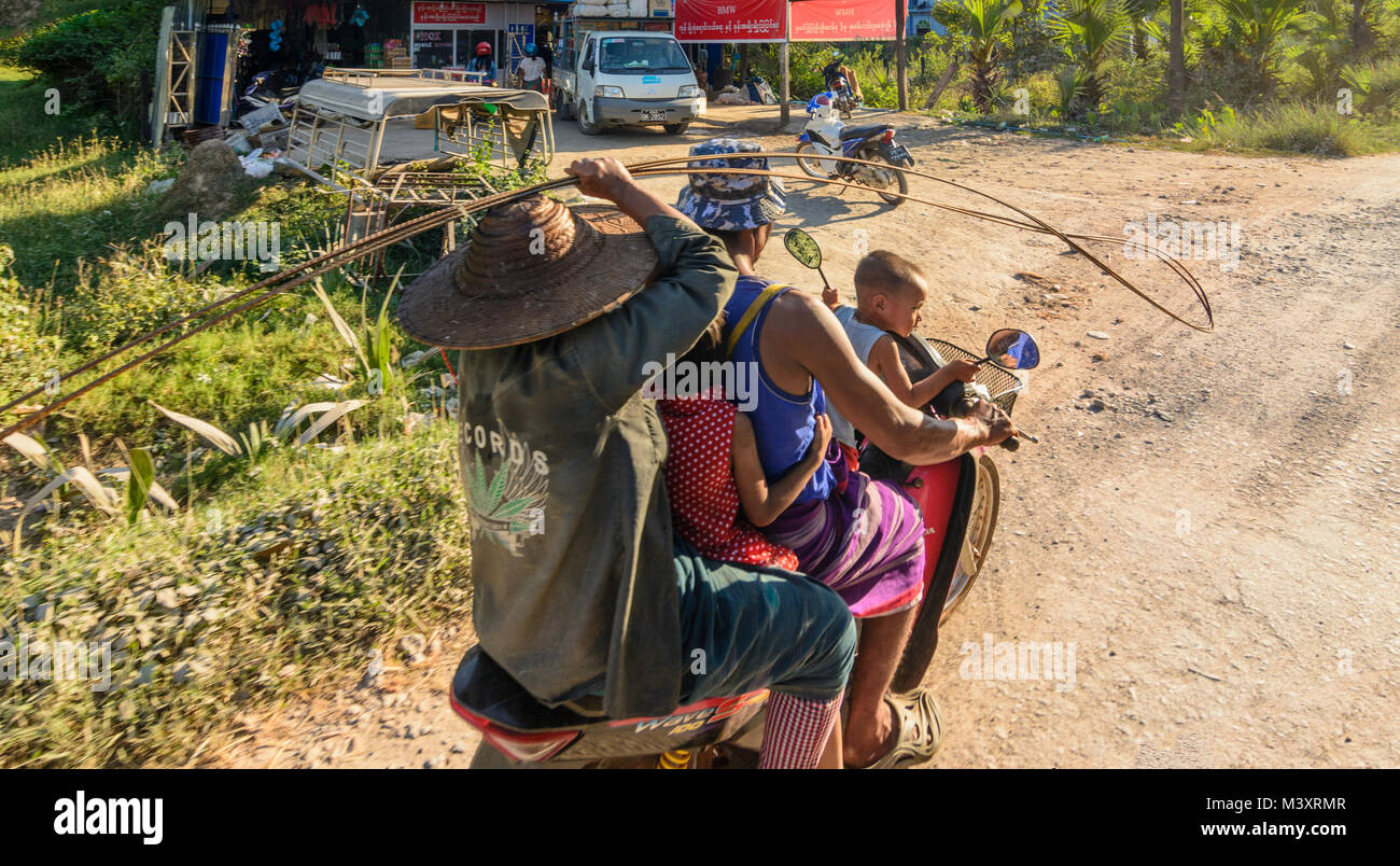 Hpa-An: crowded motorbike, man with rebar, boy, , Kayin (Karen) State ...