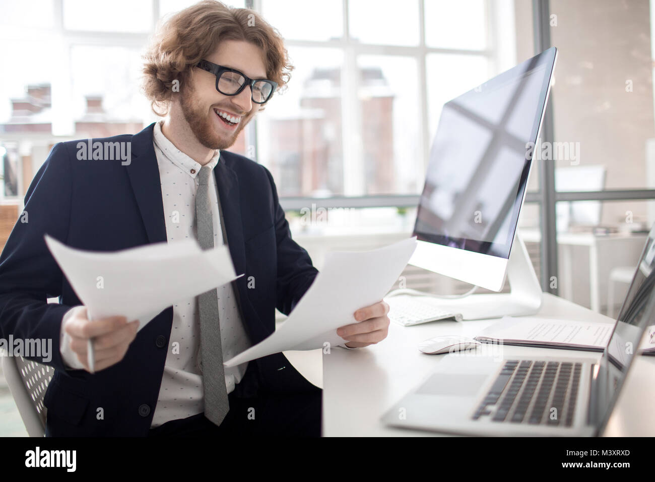 Person reading the economist hi-res stock photography and images - Alamy