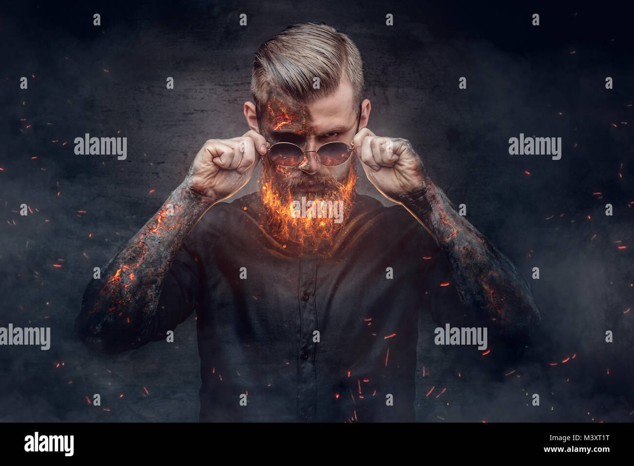An evil man with burning beard Stock Photo - Alamy