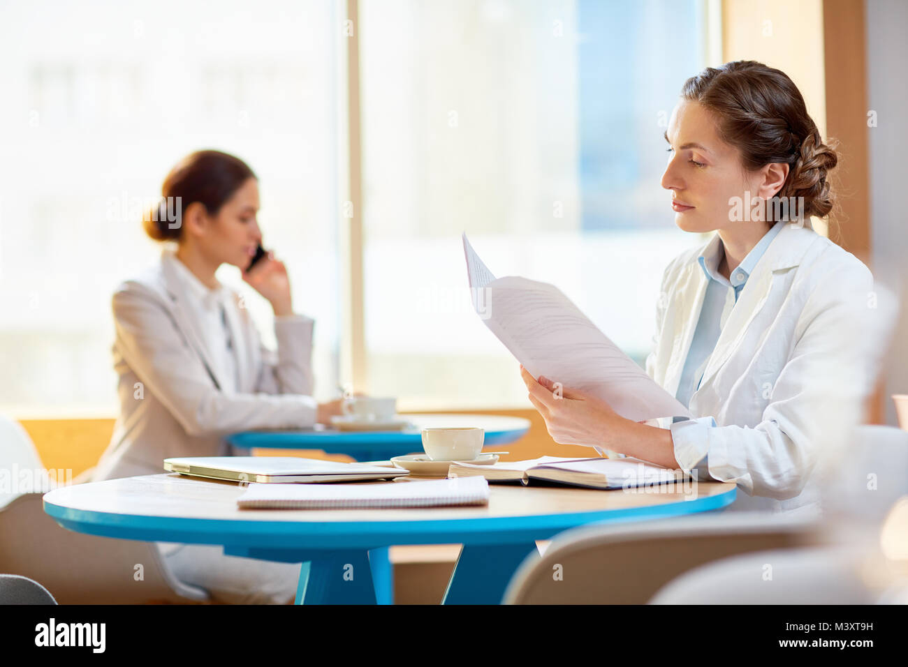 Reading new contract Stock Photo - Alamy