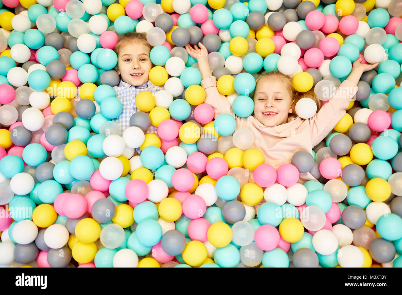 Girls in balloons Stock Photo - Alamy