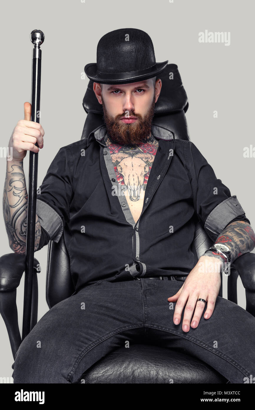 Bearded freak guy with walking stock Stock Photo - Alamy