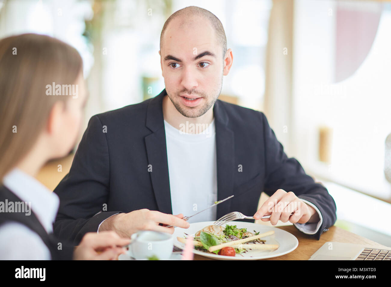 Manager talk woman restaurant hi-res stock photography and images - Alamy