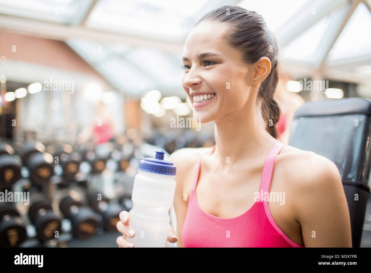 Girl having refreshment Stock Photo - Alamy