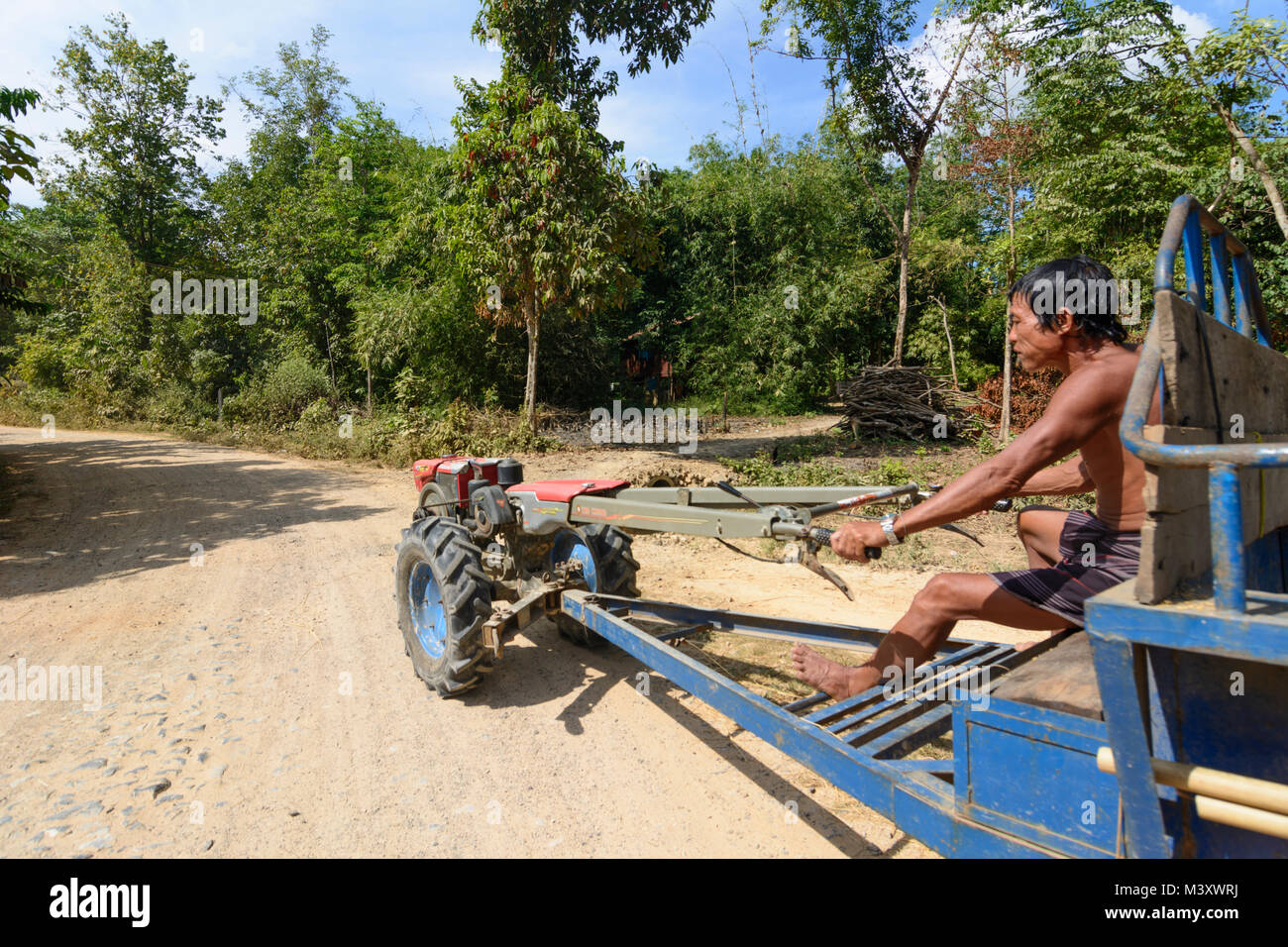 Hpa-An: man, tractor, , Kayin (Karen) State, Myanmar (Burma Stock Photo ...