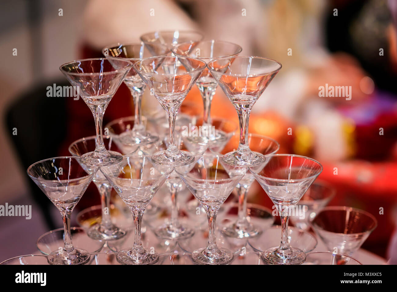 Pyramid of glasses, still empty, for beverages, wine, champagne ...