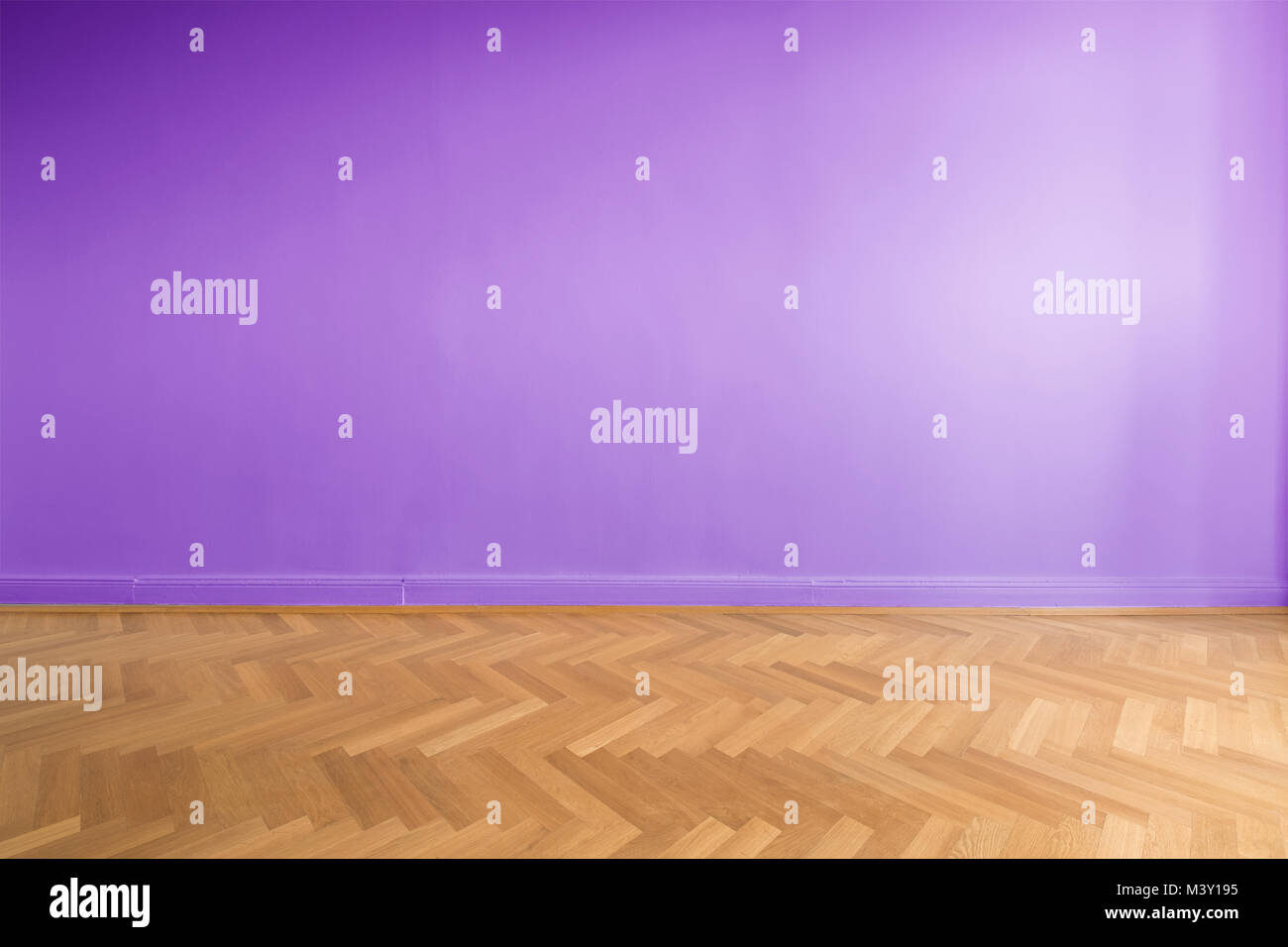 purple colored wall in empty room with wooden floor Stock Photo - Alamy