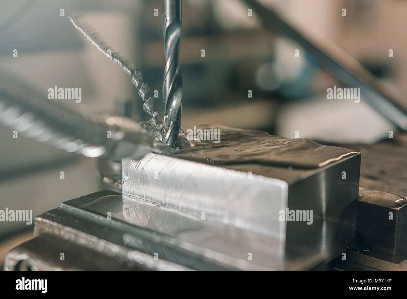 Metal drilling closeup. Metal workshop Stock Photo - Alamy