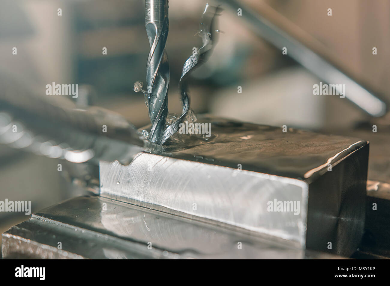 Metal drilling closeup. Metal workshop Stock Photo - Alamy