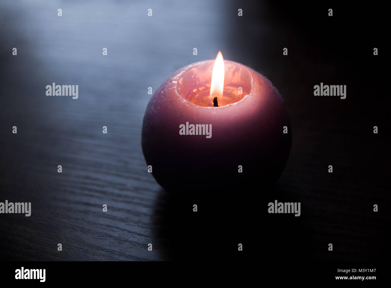 flame Candles, a candle on a table, fire Stock Photo - Alamy