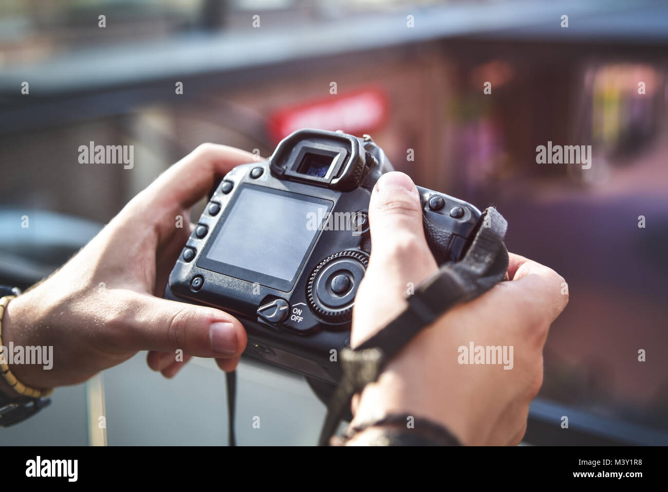 camera in hand, Street photography, photosession process Stock Photo ...