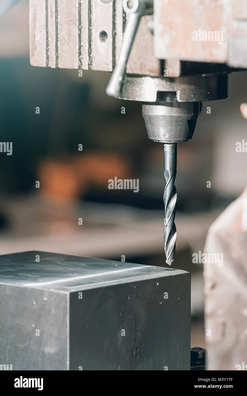 Metal drill Close-up. Metal workshop Stock Photo - Alamy