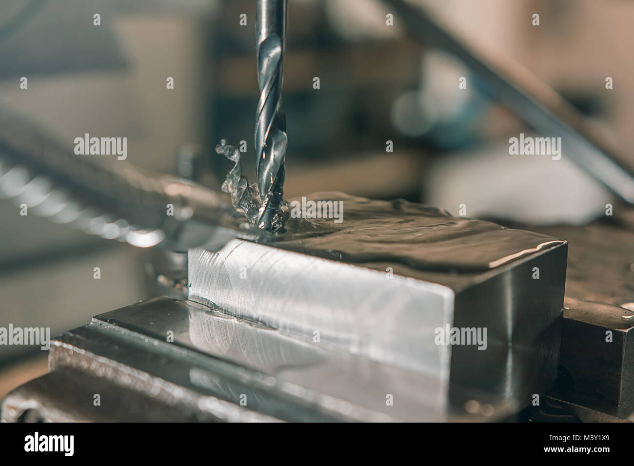 Metal drilling closeup. Metal workshop Stock Photo - Alamy