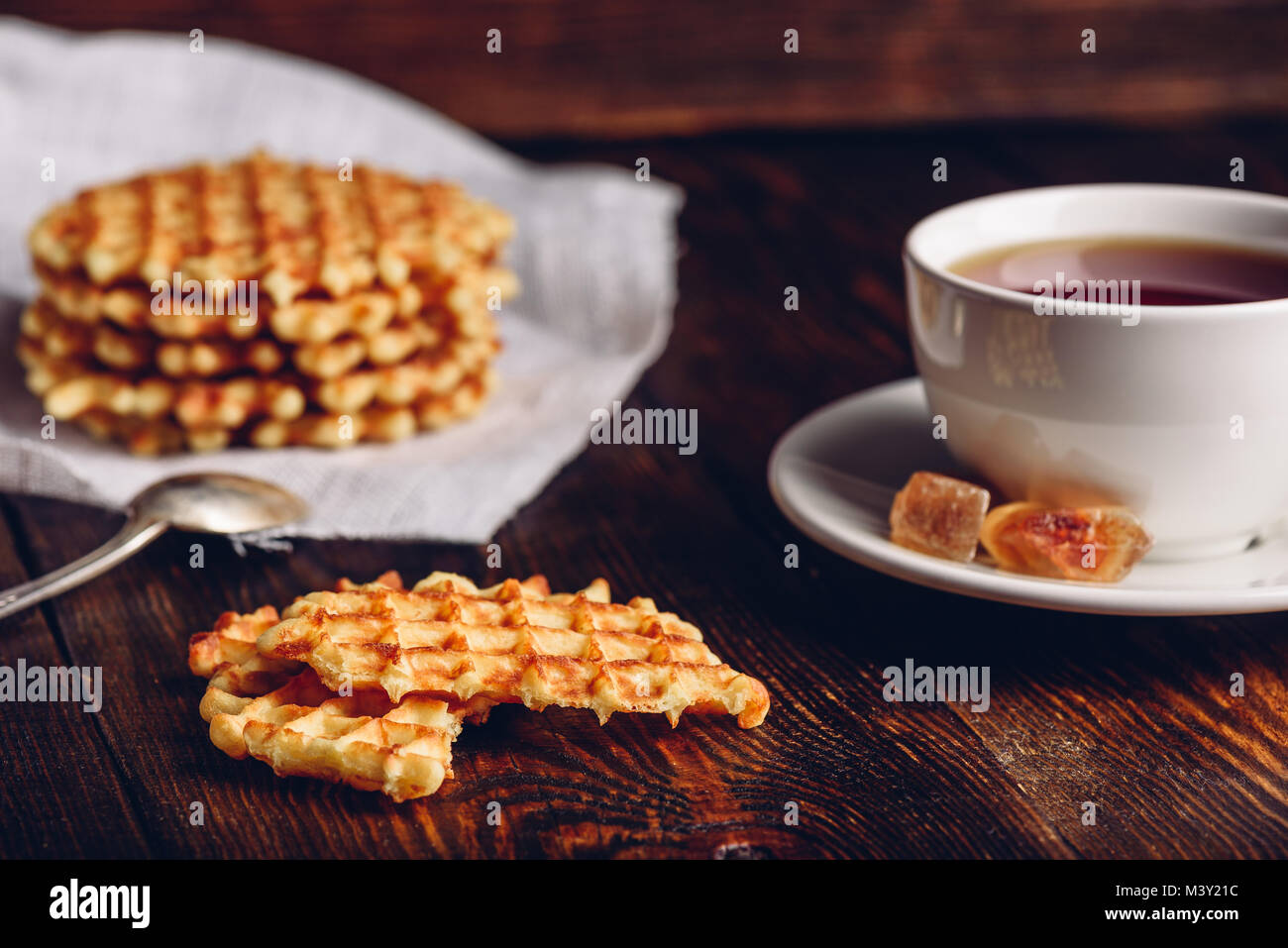 Breakfast with White Cup of Tea with Waffles Stack on Napkin and Pieces ...