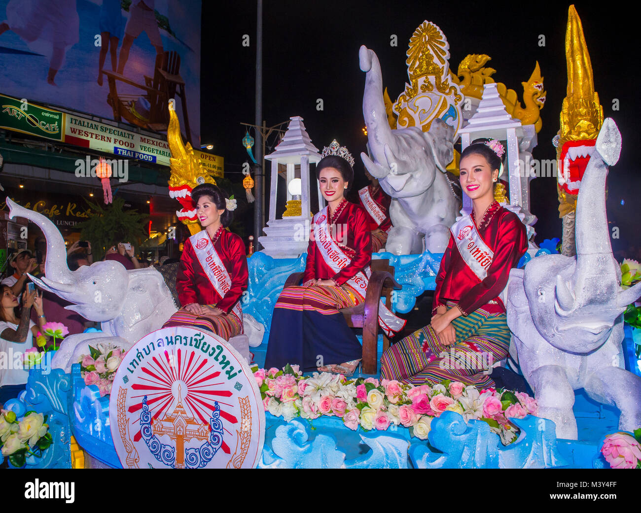 Participants in a parade during Yee Peng festival in Chiang Mai ...
