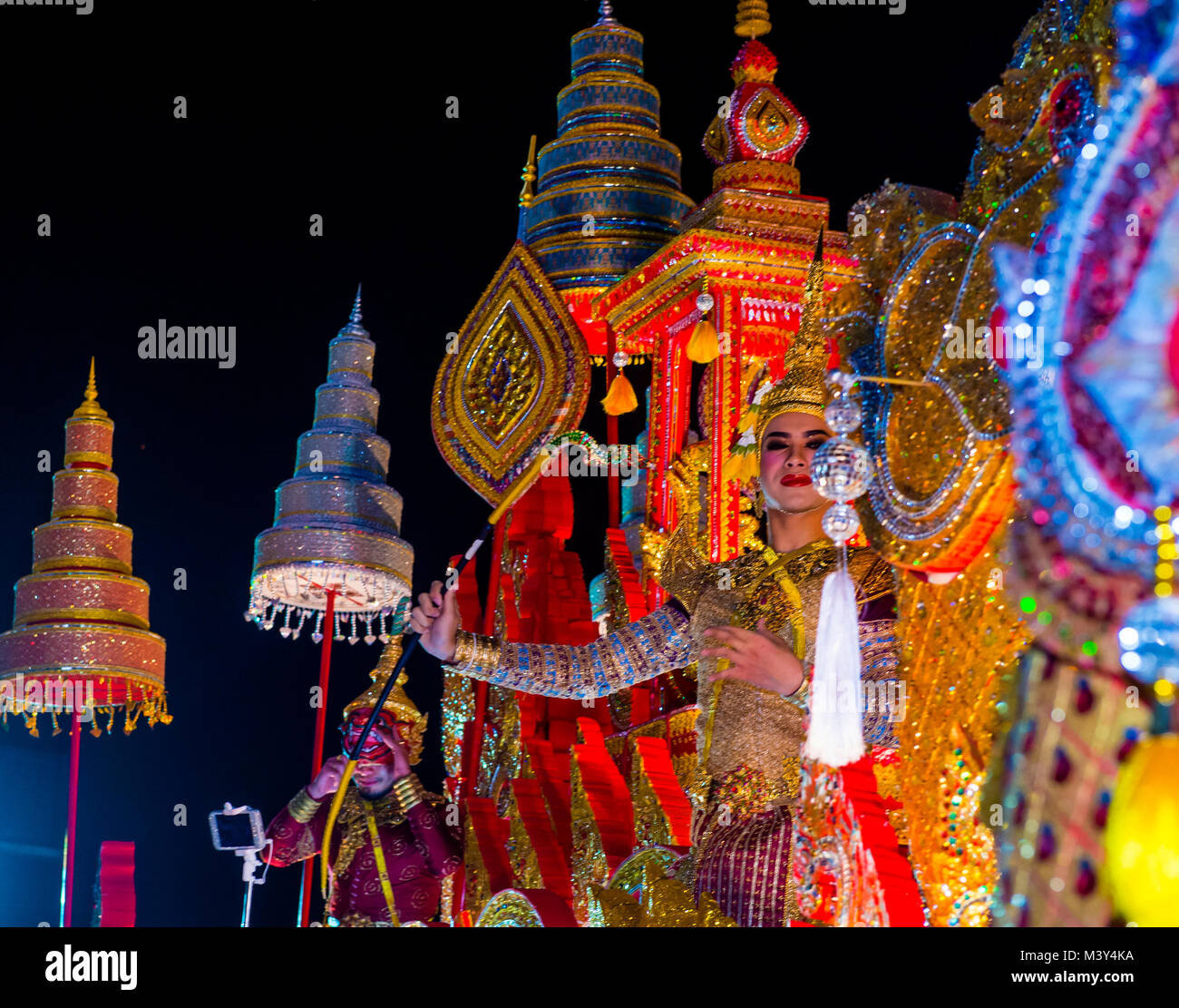 Participants in a parade during Yee Peng festival in Chiang Mai ...