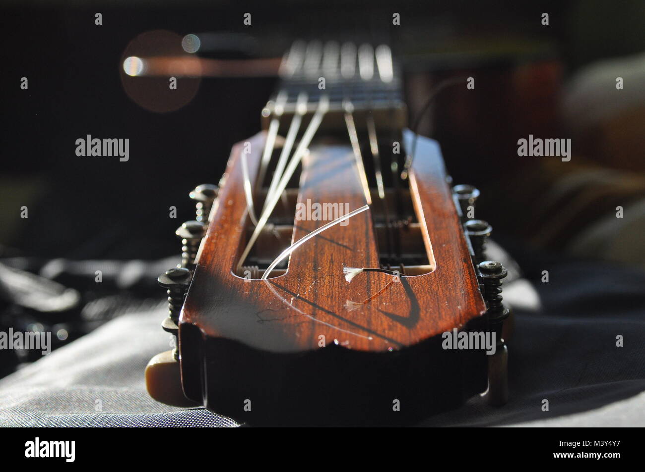 Classical guitar. Issuing a stringed instrument sounds. Fretboard ...