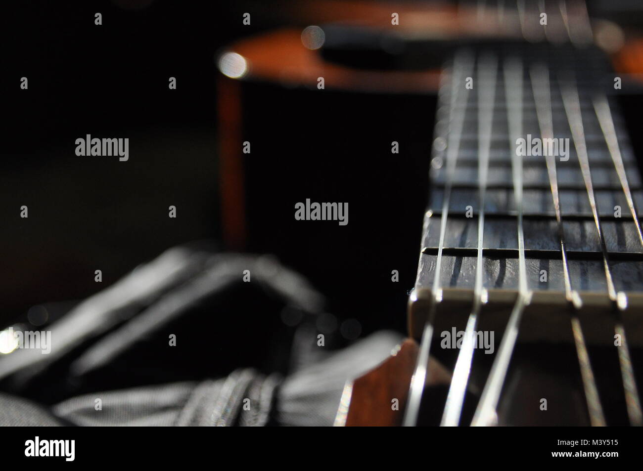 Classical guitar. Issuing a stringed instrument sounds. Fretboard ...