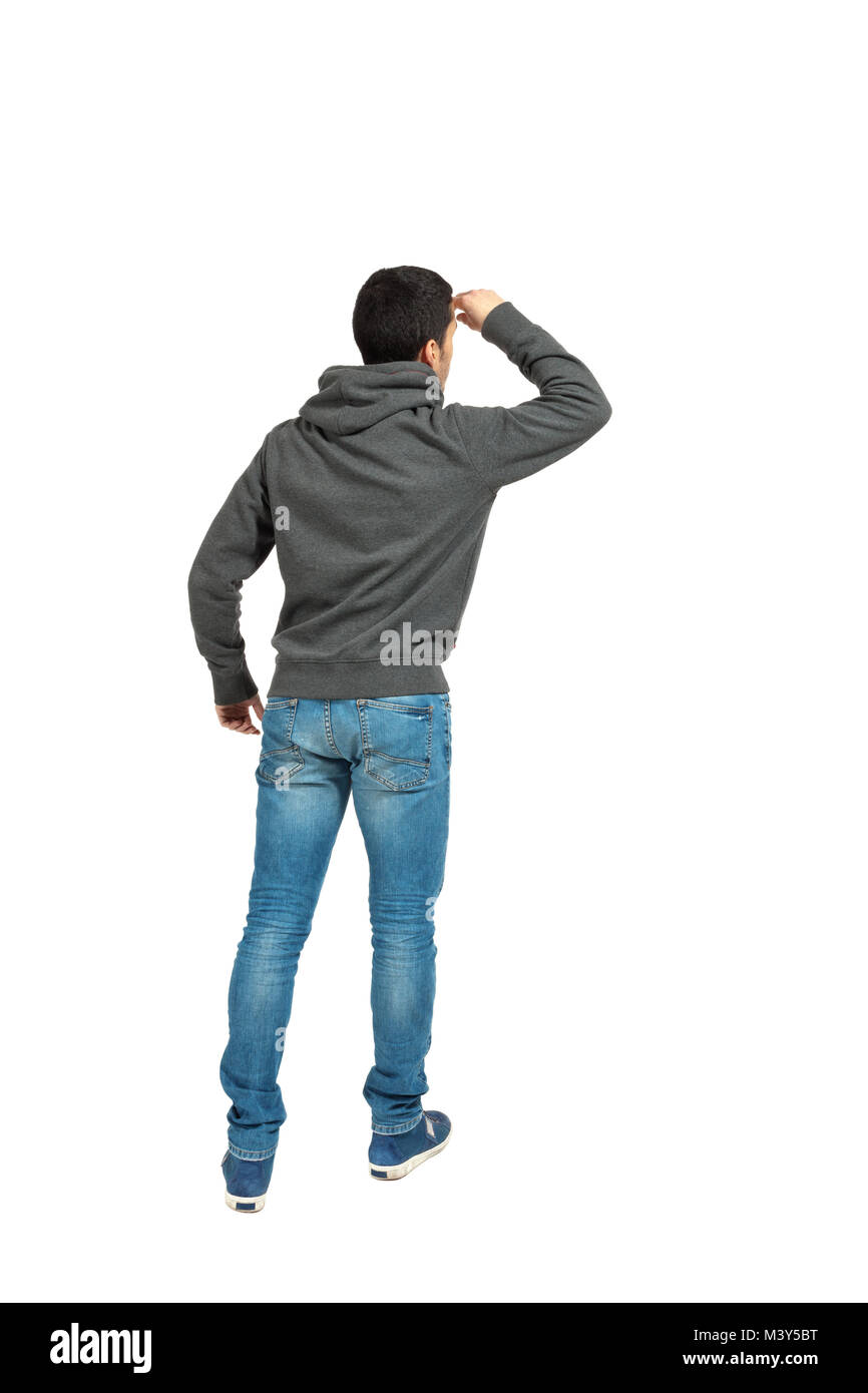Portrait of the young man isolated on a white background, back view ...
